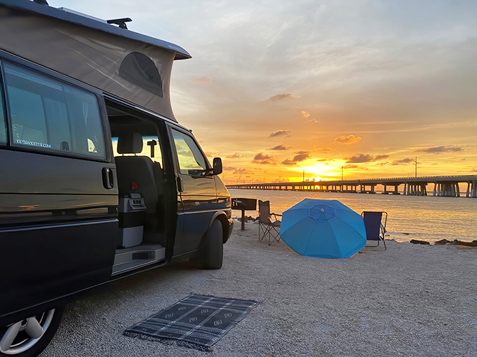 Sunset magic transforms the Florida Keys into a painter's palette as this classic VW camper claims front-row seats to nature's nightly show.