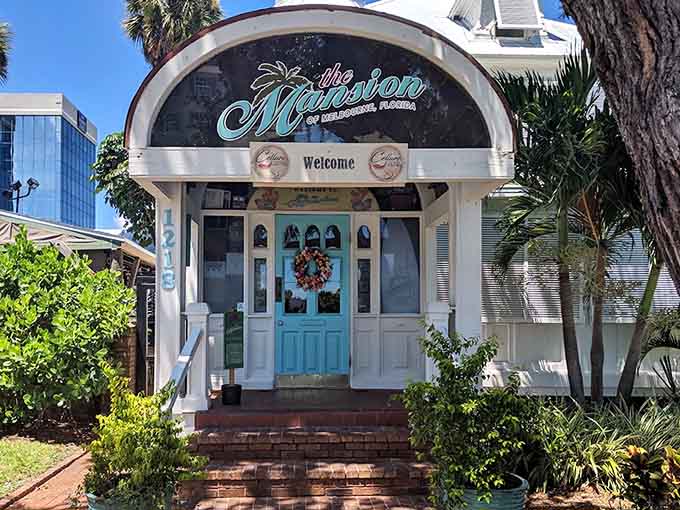 That turquoise door and white Victorian facade aren't just pretty, they're your gateway to some of the best eating in Melbourne, housed in a building that's been standing since 1903.