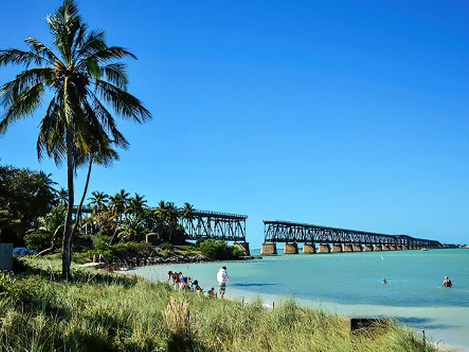 Paradise defined: Bahia Honda's iconic bridge frames turquoise waters so clear you'll swear someone's playing tricks on your eyes.