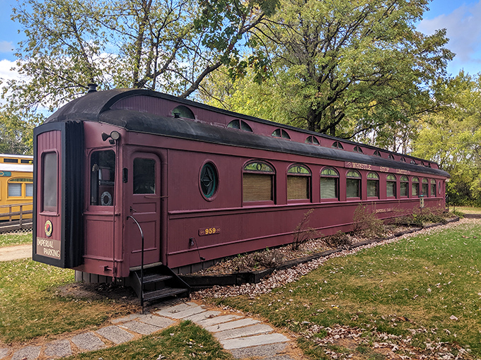 The burgundy beauty of this vintage train car beckons travelers to step back in time for a night of railroad romance.
