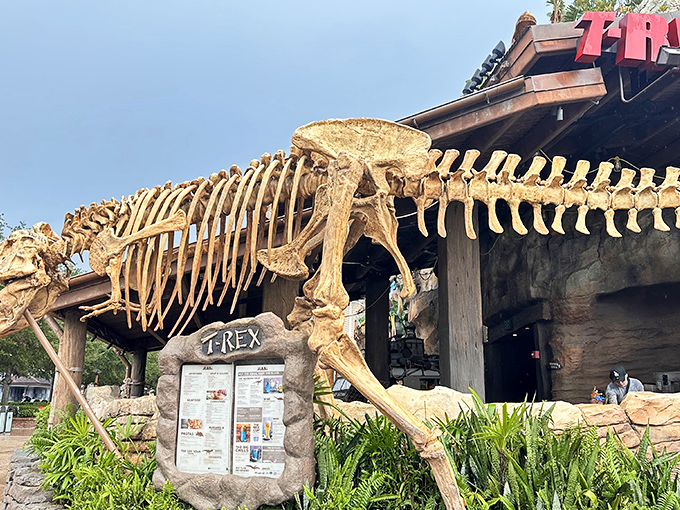 The imposing T-Rex skeleton welcomes hungry adventurers, its massive jaws promising a dining experience of prehistoric proportions.