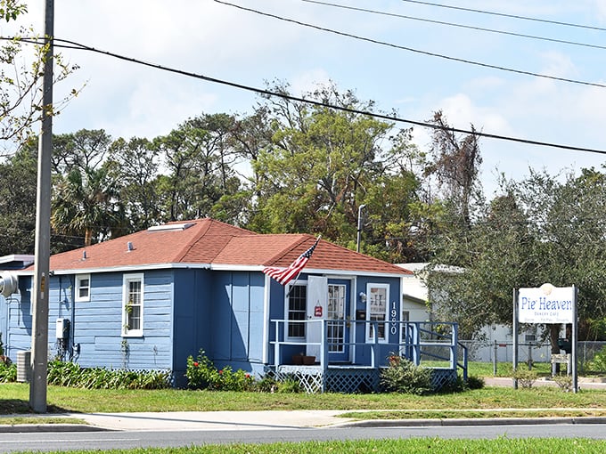 This charming blue cottage on North Palafox Street proves that paradise sometimes comes with a front porch and a pie menu.