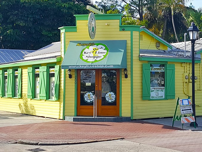 A sunshine-yellow building with vibrant green trim that practically screams "Key lime!" &ndash; like Florida sunshine captured in architectural form.