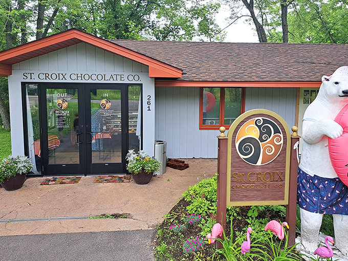 That polar bear in swim trunks greets you like Minnesota's most optimistic mascot, proving chocolate shops don't need to take themselves too seriously.