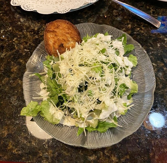 Crisp romaine lettuce crowned with Parmesan and house-made dressing &ndash; the token vegetable that makes the pasta guilt-free.