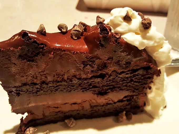 Chocolate Cake: A monument to cocoa decadence with a ganache so shiny you could check your reflection. Worth saving room for, or ordering a second stomach.