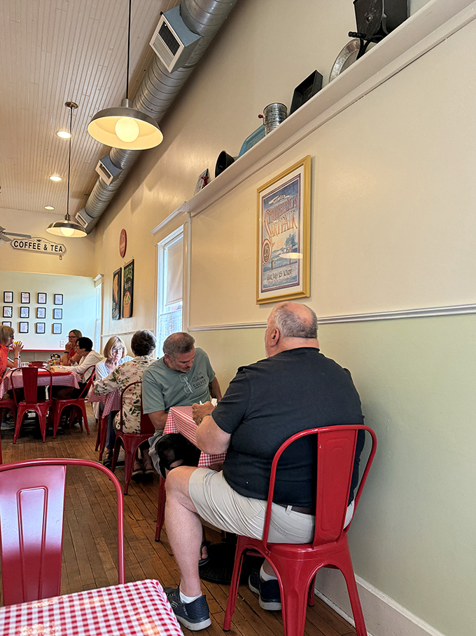 Happy customers enjoying their selections in the cozy dining area. Notice how nobody's looking at their phones? That's the power of really good pie.