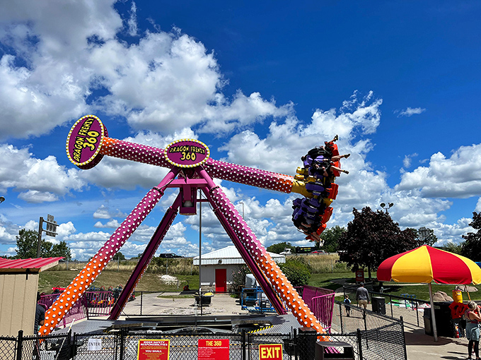 Dragon Frenzy 360 ride: Spinning with enough intensity to make you question that second slice of pizza, while riders scream with a mixture of terror and delight.