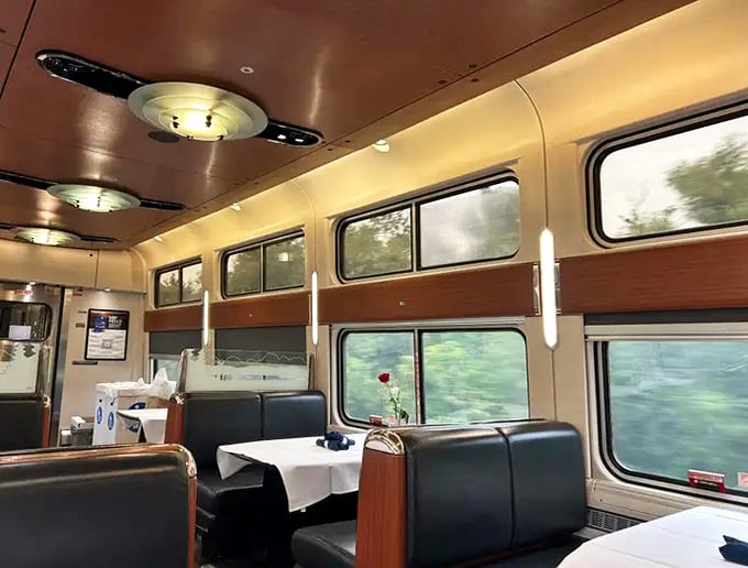 The dining car transforms travel time into a culinary experience &ndash; white tablecloths included, airplane food nightmares excluded.