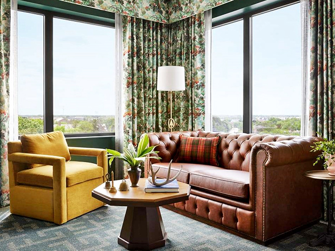 This cozy corner suite combines mid-century modern touches with collegiate charm &ndash; note the perfect reading nook by the window.