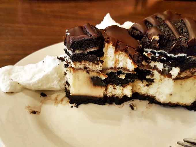 Oreo cheesecake that strikes the perfect balance between rich creaminess and chocolate cookie crunch &ndash; a sweet finale to a savory adventure.