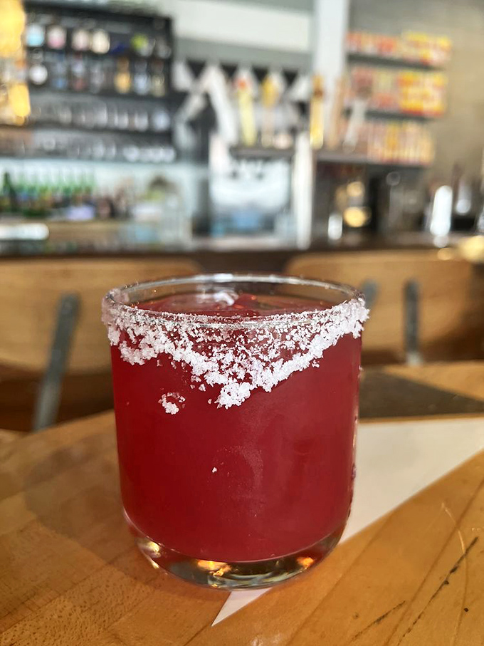 The Prickly Pear Margarita &ndash; a vibrant pink showstopper that tastes like summer in the middle of a Michigan winter.