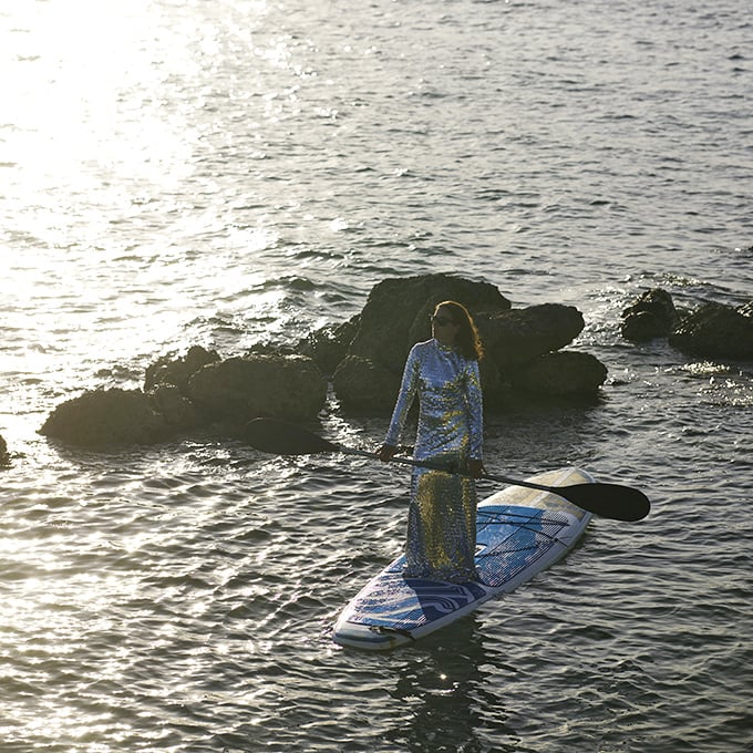Stand-up paddleboarding becomes a journey over liquid crystal &ndash; with only fish to judge your wobbly technique.