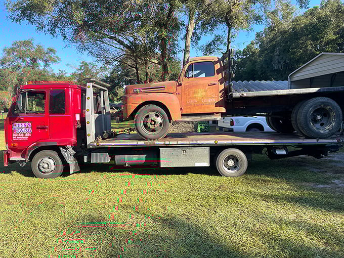 Vintage meets modern: a classic truck gets a lift to its new home, adding to the resort's charming blend of old and new.