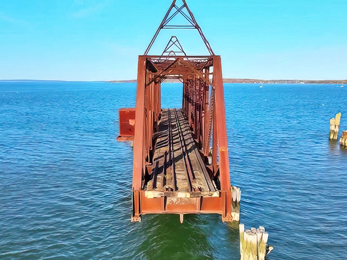 The swing bridge and trestle combination showcases Victorian engineering prowess. They built things to last back then, even if they didn't last forever.