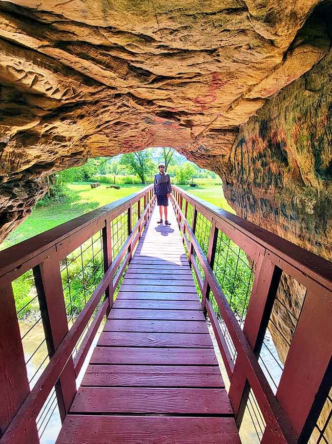 Perspective check: standing small against nature's grandeur reminds us of our brief moment in earth's magnificent timeline.