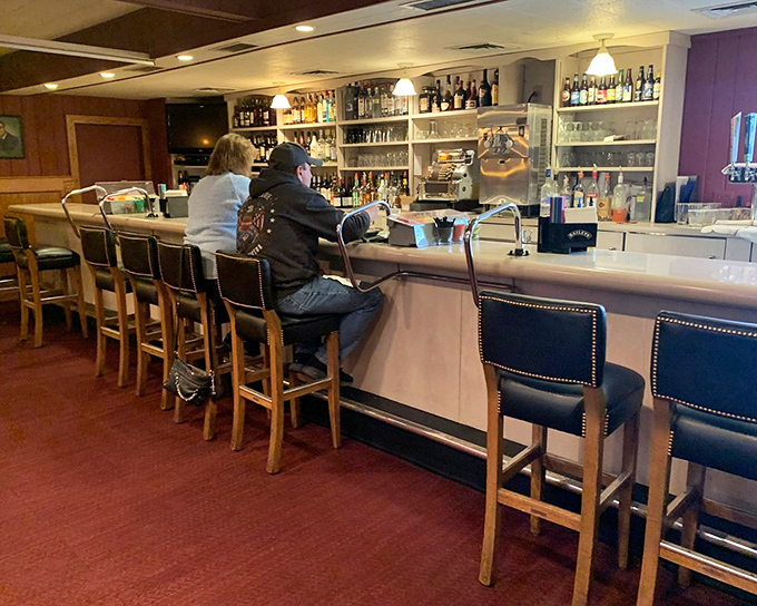 The bar beckons with its warm glow and lineup of bottles, promising libation salvation after a long day of Minnesota nice.