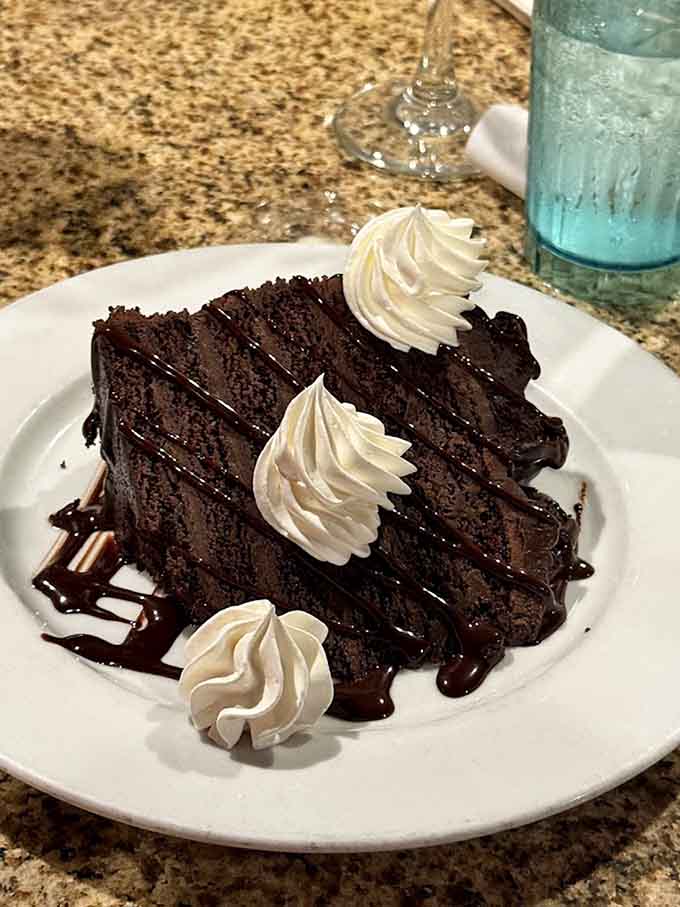Death by Chocolate isn't just a clever name, it's a multi-layered promise of pure chocolate bliss that could easily feed two (but probably won't).