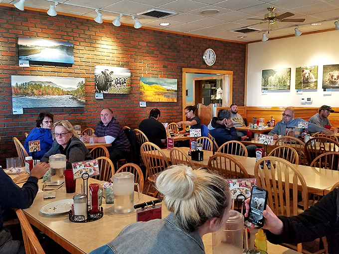 Local photography adorns brick walls, reminding diners they're experiencing authentic Maine, not some cookie-cutter chain restaurant.