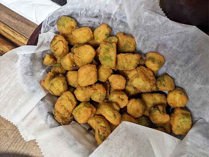 Golden fried okra nuggets are the gateway vegetable that might just convert skeptics into believers, one crispy bite at a time.