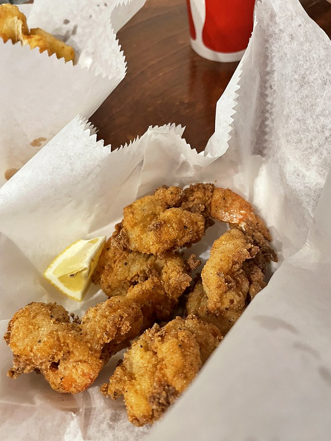 Plump, juicy shrimp encased in golden batter &ndash; each one a perfect bite of oceanic sweetness with a satisfying crunch.