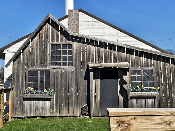 This weathered building has stories embedded in every board, each crack and nail a testament to the craftsmanship and determination of its builders.