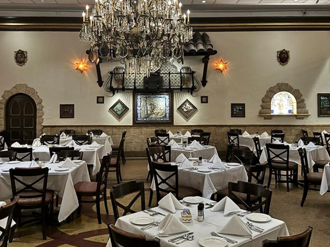 Each dining room tells its own story through Spanish tiles, wrought iron, and warm lighting that flatters everyone.