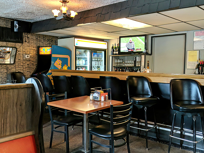 The bar area invites locals to pull up a stool, catch the game, and enjoy a cold one in this quintessential Michigan roadhouse.