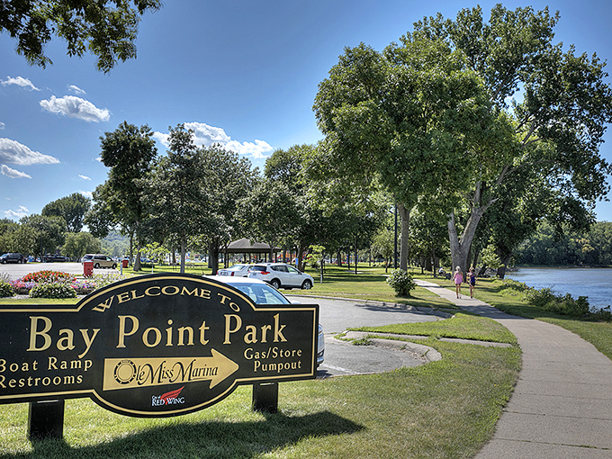 Bay Point Park welcomes visitors with shady trees and river views, offering a perfect picnic spot between train adventures.