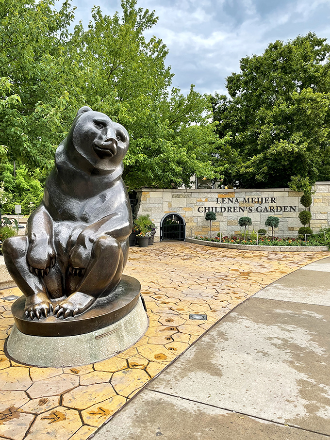 This bronze bear guards the entrance to the children's garden with a friendly demeanor that says, "Come play, but don't pick the flowers."