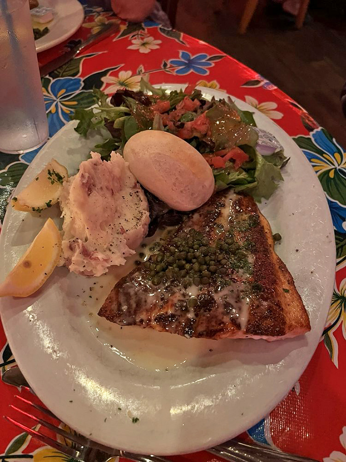 Blackened salmon that proves fish can be both elegant and comforting, especially when served with those cloud-like mashed potatoes.