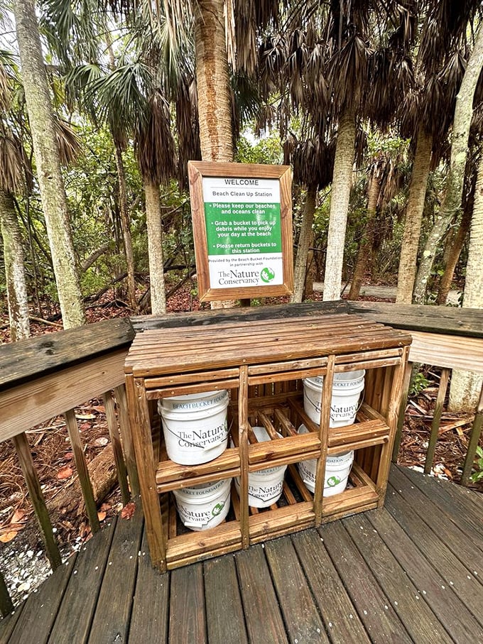 Conservation in action! The Nature Conservancy provides beach cleanup buckets, inviting visitors to become part of the preservation effort.