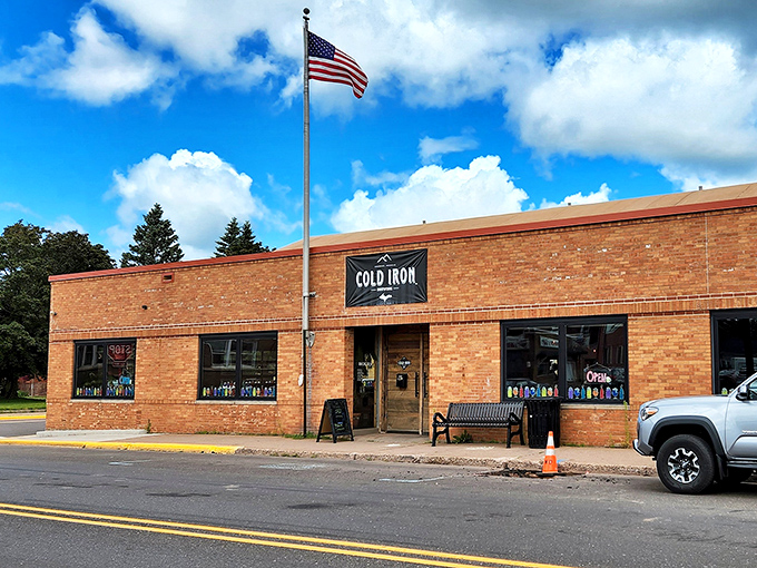 Cold Iron Brewing crafts liquid stories in pint glasses, where historic brick walls and modern brewing tanks create the perfect atmosphere for solving world problems.