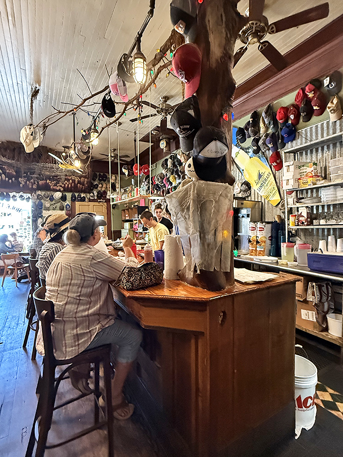 The heart of the operation &ndash; a well-worn counter where locals gather, stories are shared, and oysters are shucked with practiced precision.
