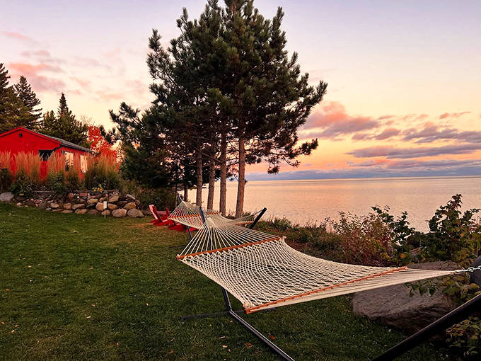 A hammock sways gently near the water's edge, offering the perfect spot for post-sauna napping or pretending to read.