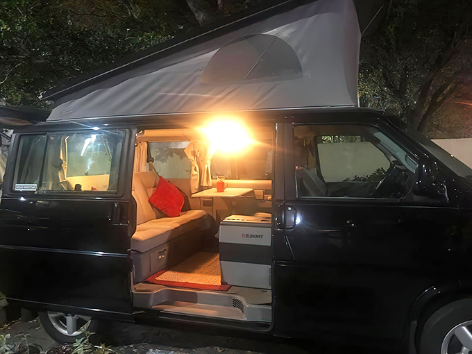 When darkness falls, this VW's interior glows like a lantern, creating a cozy sanctuary after a day of Florida Keys exploration.