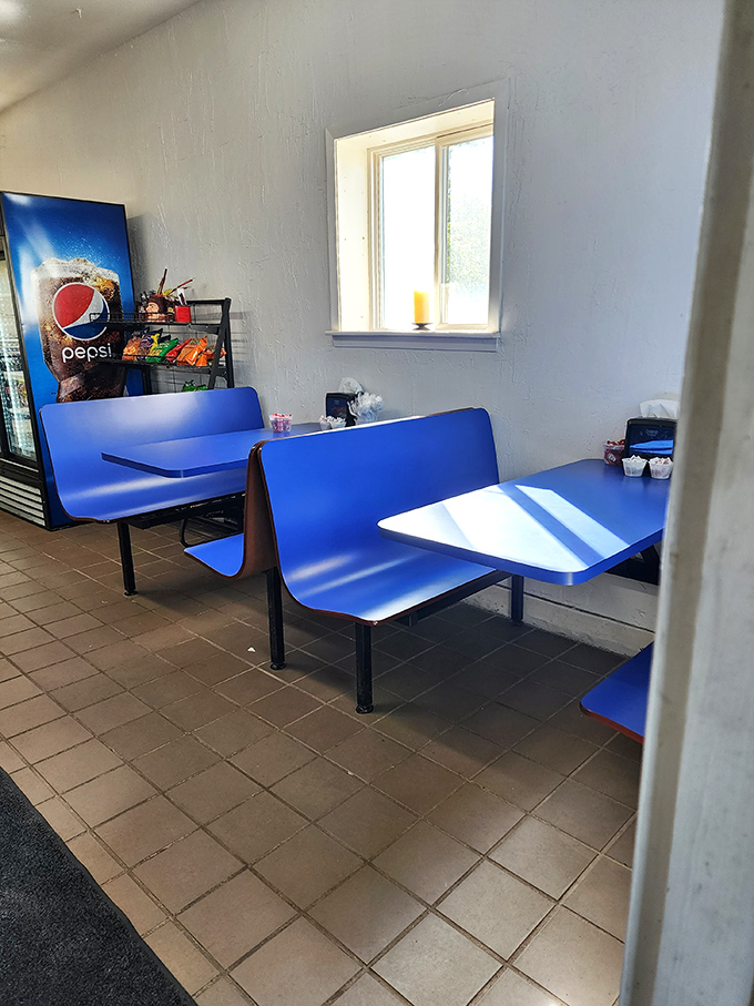 Blue booths offer comfortable seating in unpretentious surroundings &ndash; where the focus remains squarely on the food, not fancy decor.