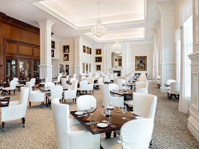 Stirrups Restaurant elevates dining with its pristine white d&eacute;cor, where every meal feels like a special occasion worth dressing for.