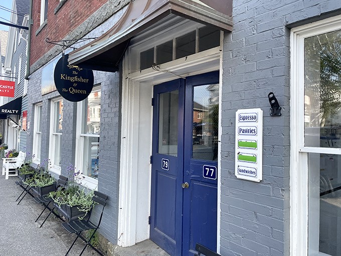 The Kingfisher & the Queen caf&eacute; &ndash; where coffee dreams and pastry fantasies come true. That blue door promises delicious secrets within.