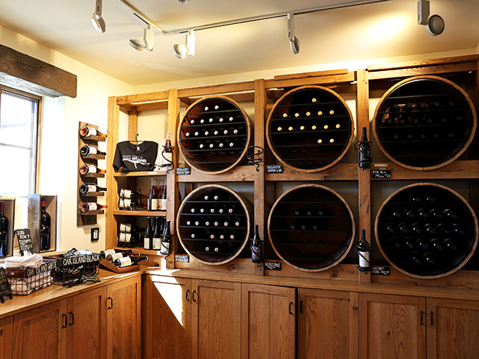 Creative bottle displays showcase Mari's impressive portfolio, each label representing a unique expression of what's possible when Old World techniques meet Michigan terroir.