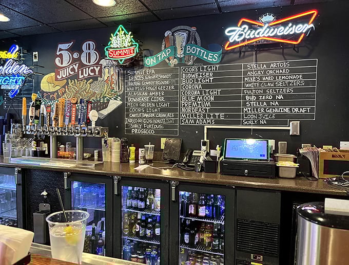 The bar beckons with local brews on tap and neon signs glowing &ndash; a beacon for thirsty travelers seeking liquid courage before tackling their first Juicy Lucy.