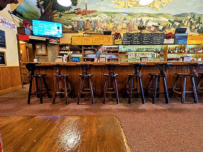 The bar area invites lingering conversations over cold beers, with a mural that tells stories of Wisconsin's pastoral heritage.