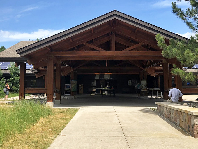 The visitor center welcomes explorers with its distinctive architecture, blending seamlessly with the natural surroundings it celebrates.