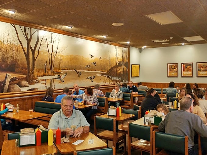 The dining room buzzes with happy eaters while a stunning wildlife mural provides the perfect Minnesota backdrop.