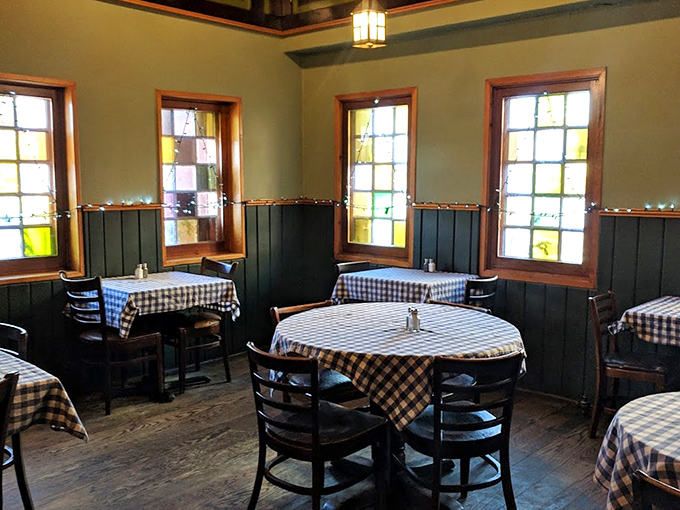 Stained glass windows and intimate tables create dining spaces that feel both special and homey. Like eating in your German grandmother's fancy room!