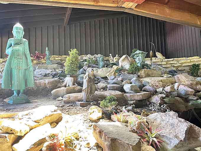 Eastern influences meet Wisconsin wilderness in this serene rock garden, where stone statues stand in silent meditation among the elements.