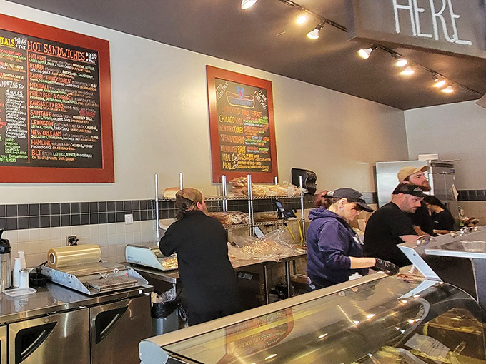 The service counter &ndash; where friendly faces transform your sandwich wishes into wrapped reality.