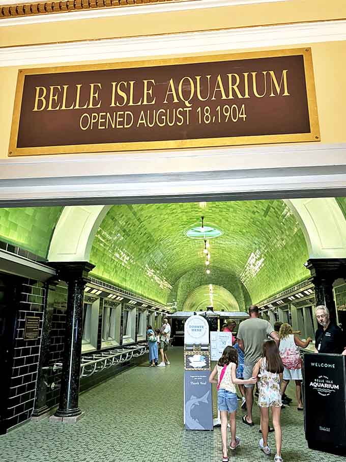 The historic plaque reminds us that since 1904, generations of Detroiters have walked these halls, creating a living legacy of wonder.