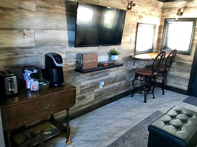 Relax in our cozy dining area featuring a large flat-screen TV and a convenient coffee station for your morning brew.
