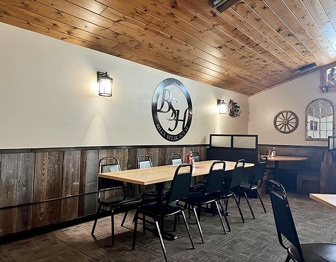 Rustic wood meets modern comfort in this dining area where the BSH logo reminds you you're somewhere special.
